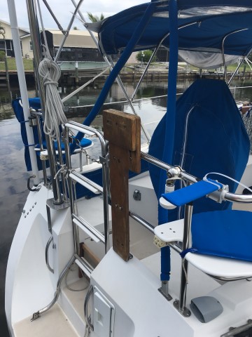 Anyone ever mount a dinghy outboard motor on a stern rail mounting ...